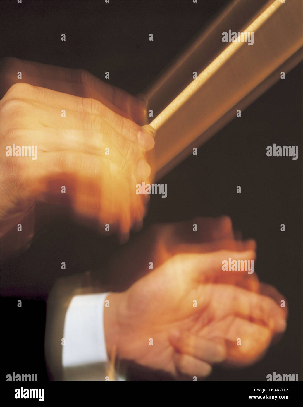 Hands of conductor Stock Photo - Alamy