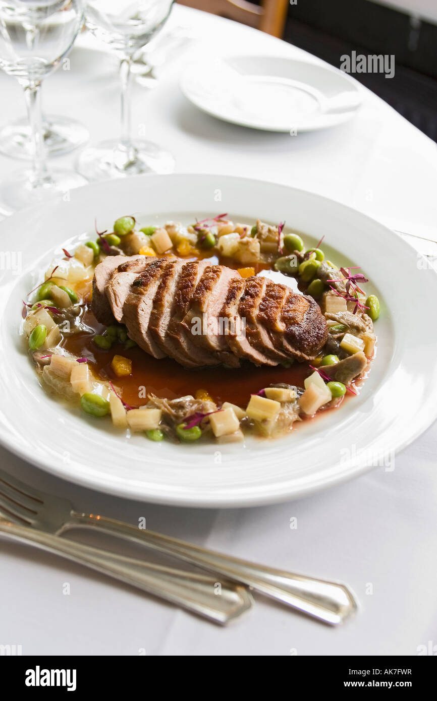 A dish of sliced meat on plate Stock Photo - Alamy