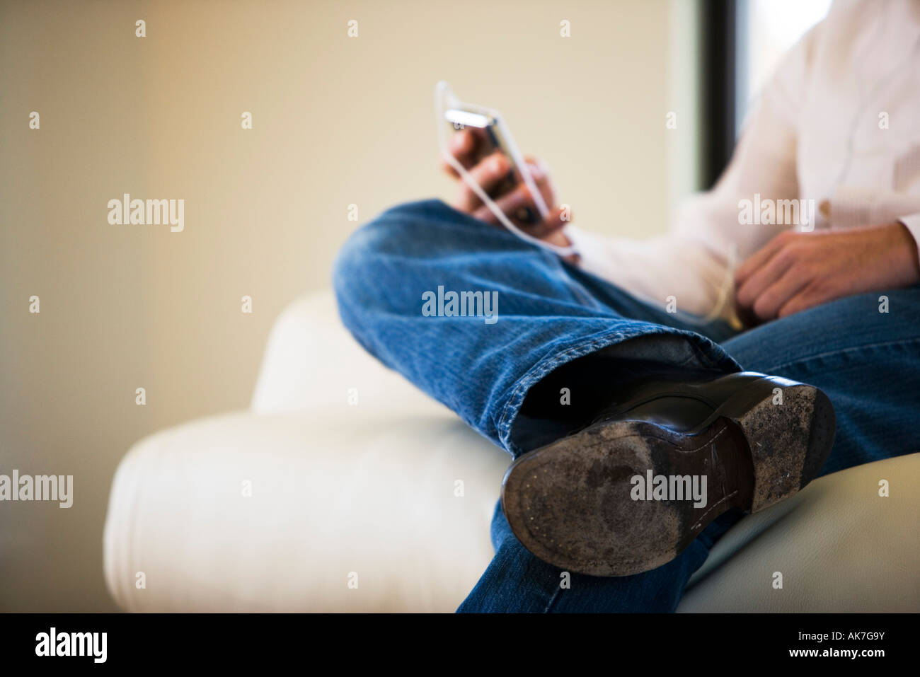 Man Listening to MP3 Player Stock Photo - Alamy