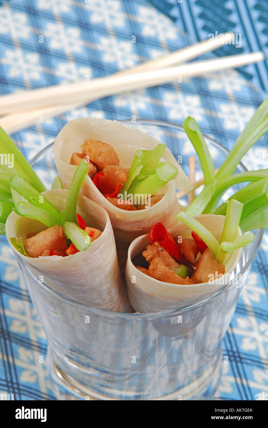 Canapes of Chinese-style pancakes with Sichuan chicken and spring ...