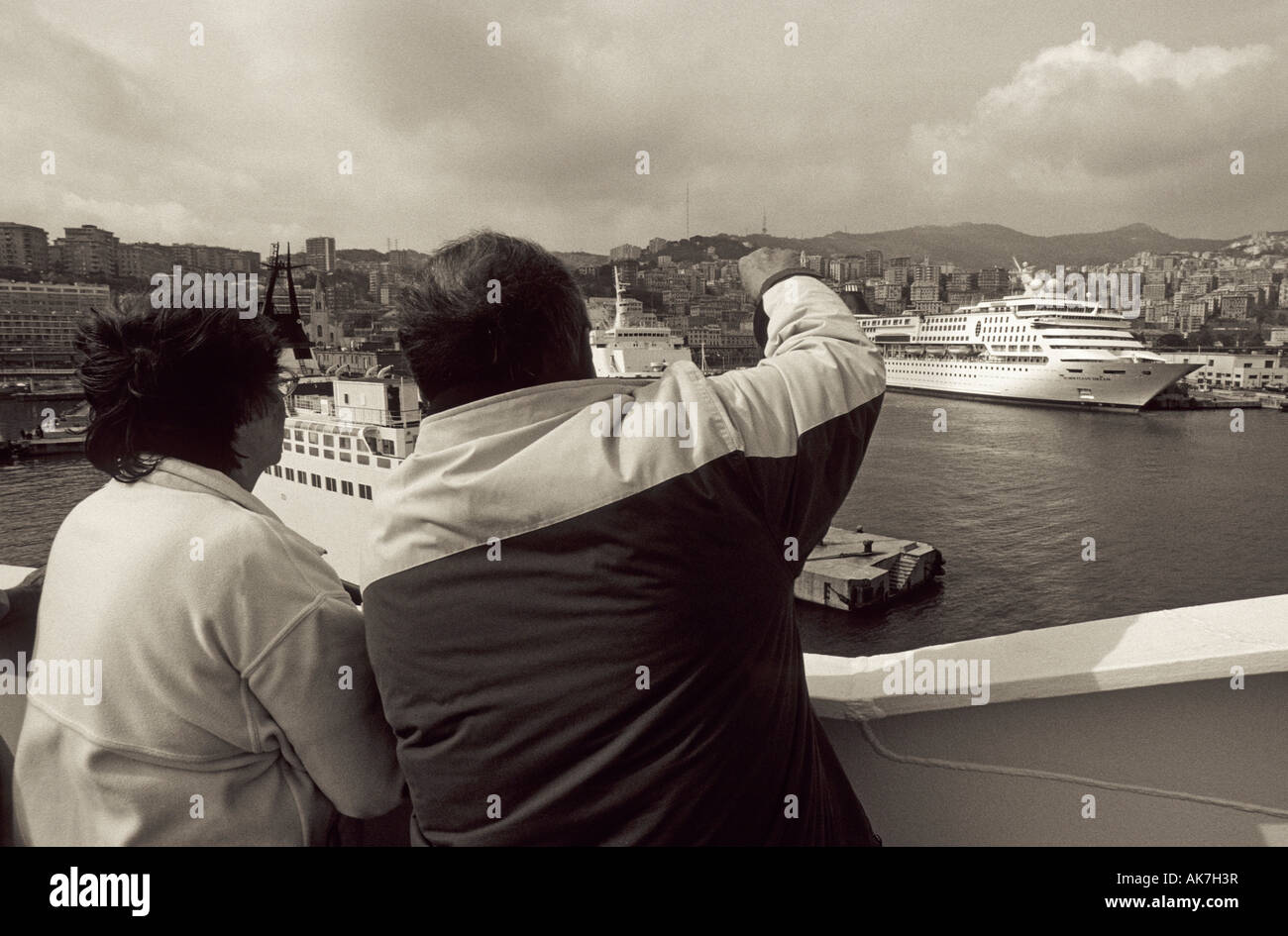 passengers of a ship reaching the port of Genoa Italy Stock Photo - Alamy