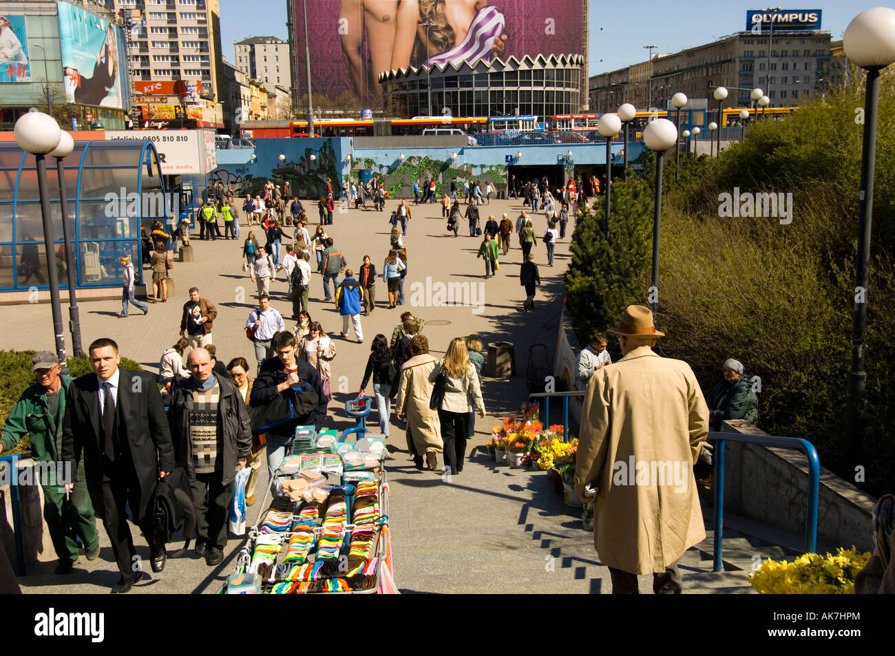 Passersby and commuters by Metro station Centrum Plac Defilad Warsaw ...