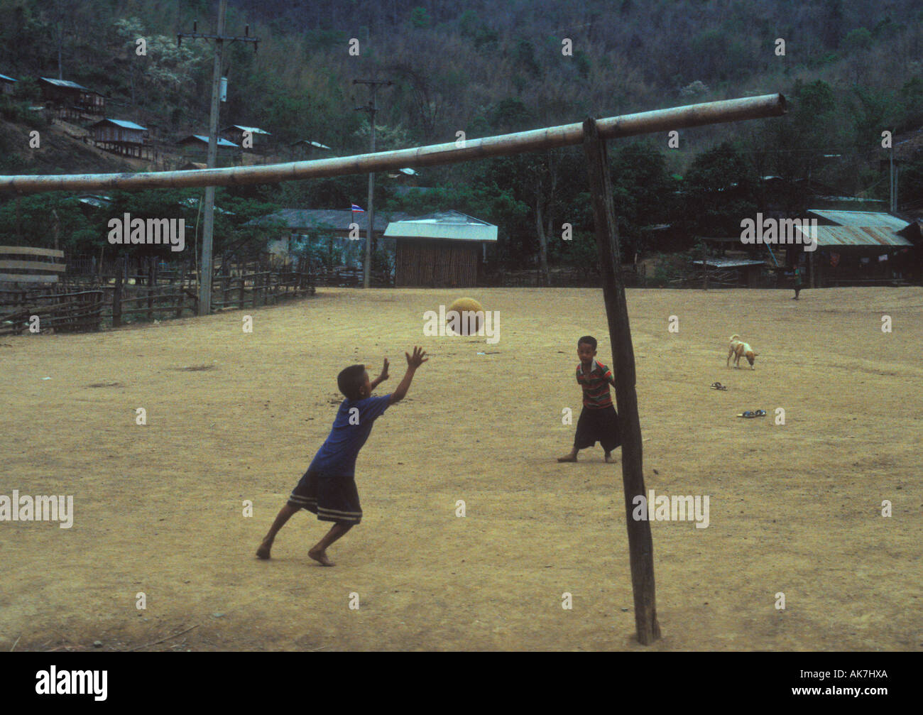 Kids play football in a hilltribe village near Mae Hon Song, Thailand ...