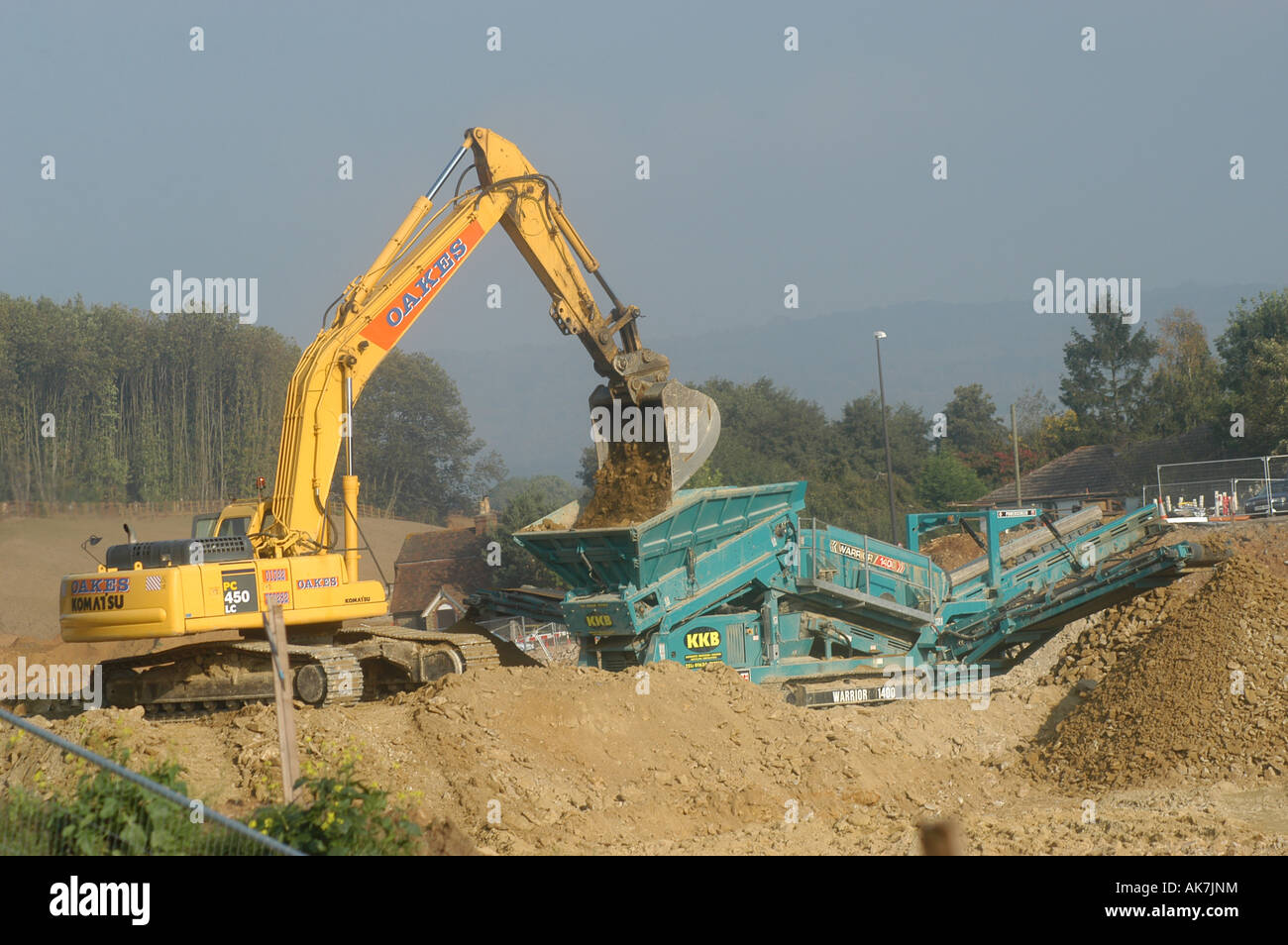 Digger in action hi-res stock photography and images - Alamy
