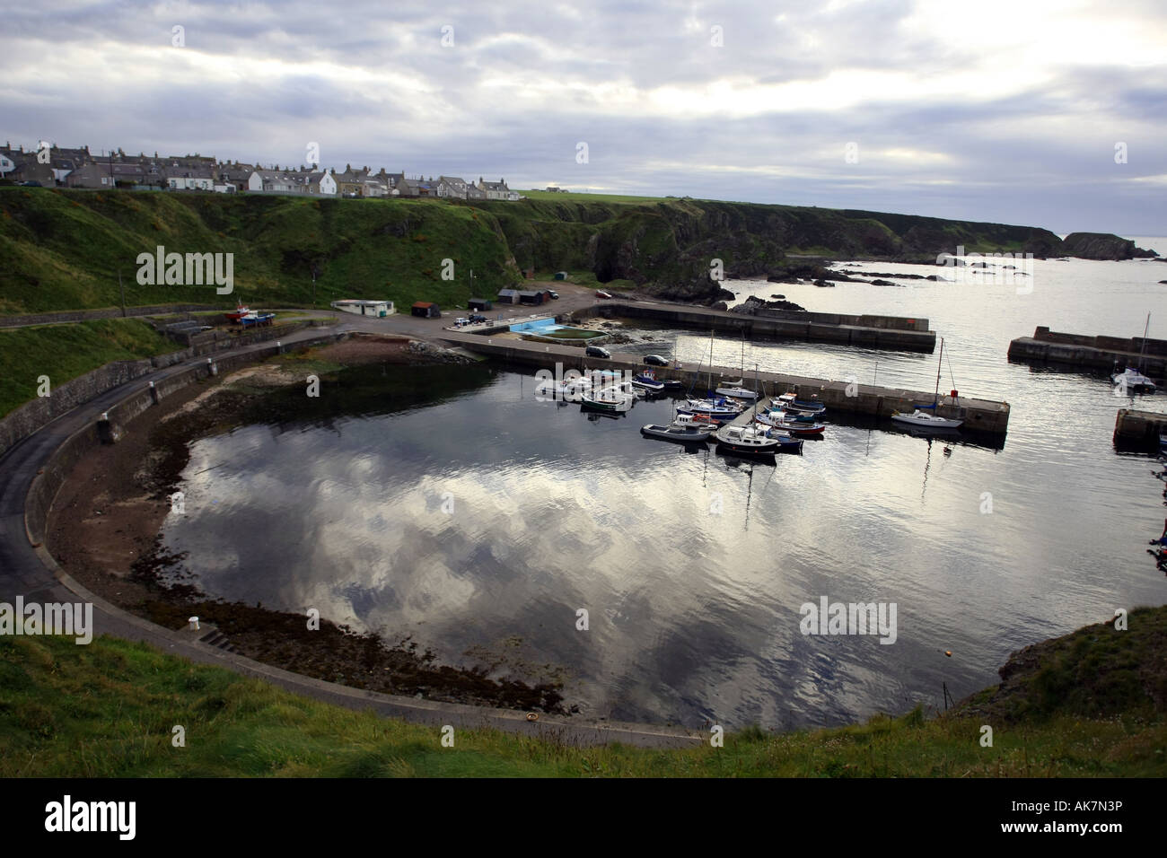 The harbour of the fishing village of Portknockie on the Moray Coast at ...