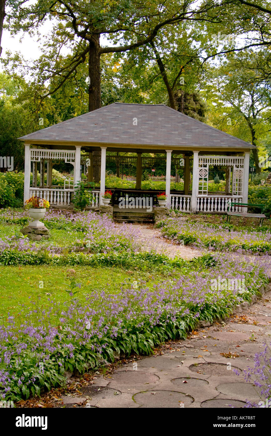 path with flowers toward a pavilion used for meditation at a religious ...