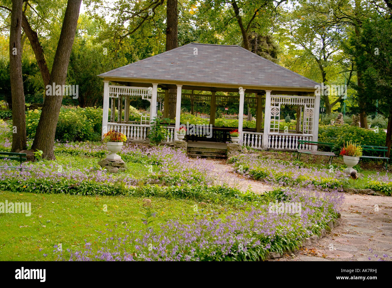 path with flowers toward a pavilion used for meditation at a religious ...