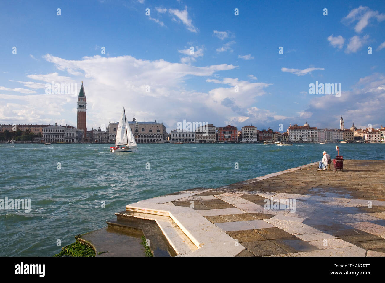San Giorgio Maggiore quay jetty with fisherman Venice waterfront ...