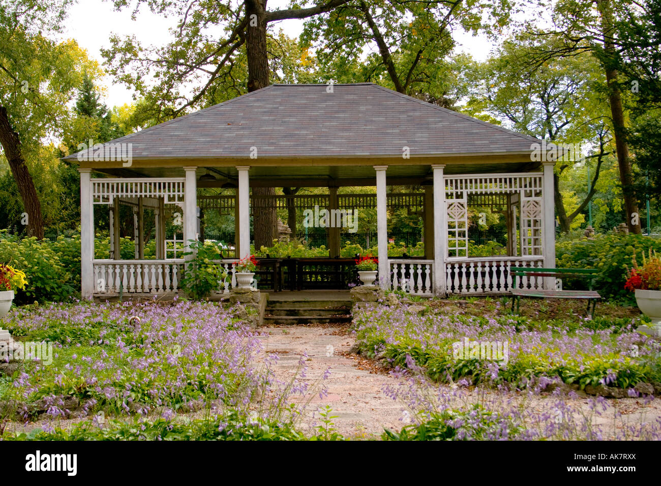 path with flowers toward a pavilion used for meditation at a religious ...
