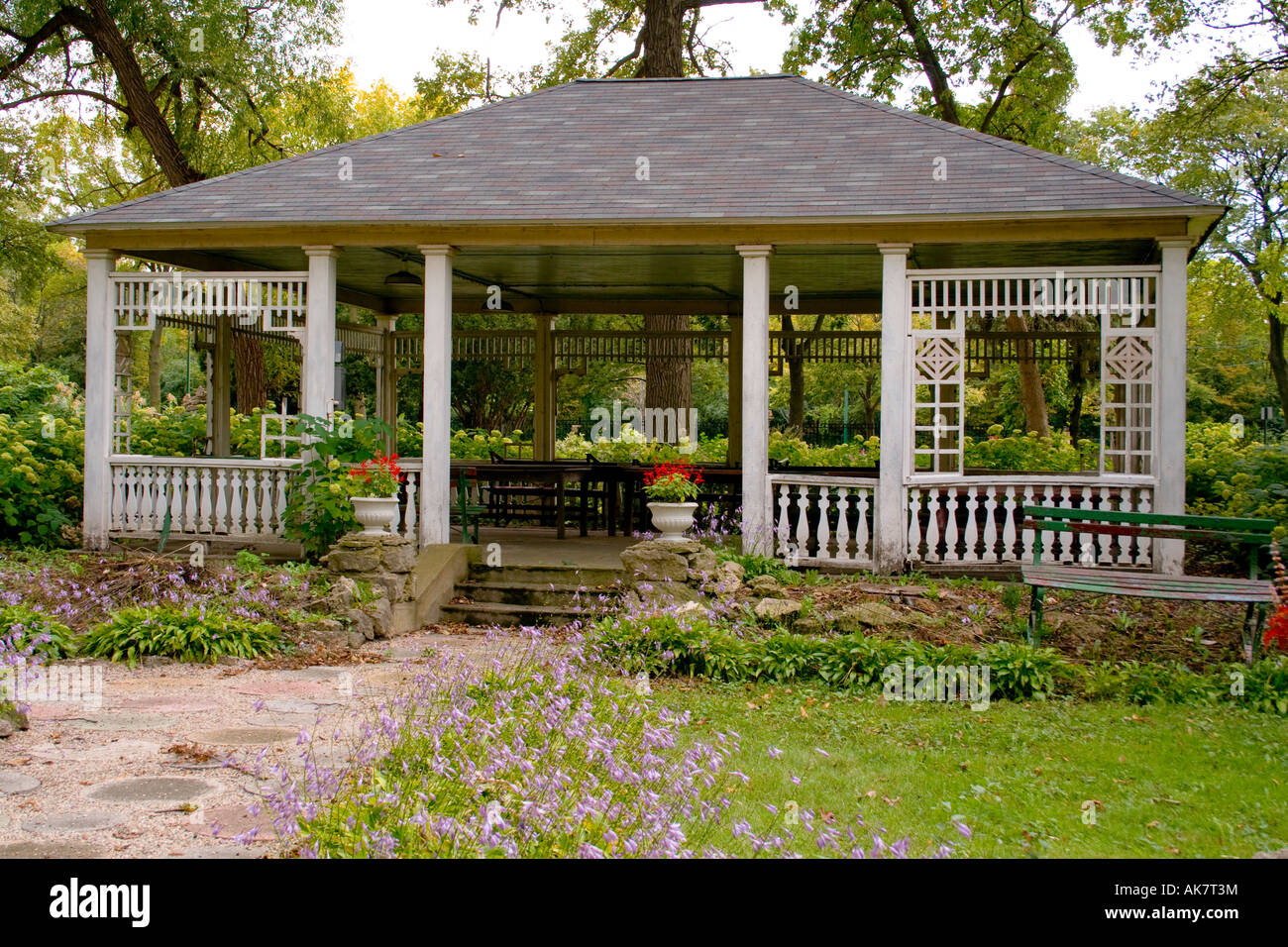 path with flowers toward a pavilion used for meditation at a religious ...