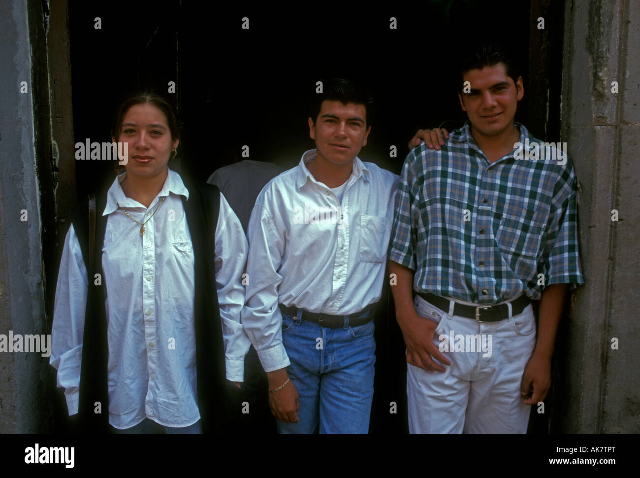 3, three, Mexicans, Mexican people, young men, young woman, eye contact ...