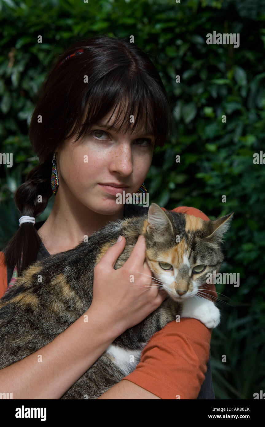 Teenage girl holding cat portrait hi-res stock photography and images ...