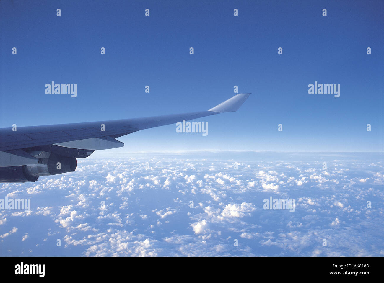 Airplane wing clouds Stock Photo - Alamy