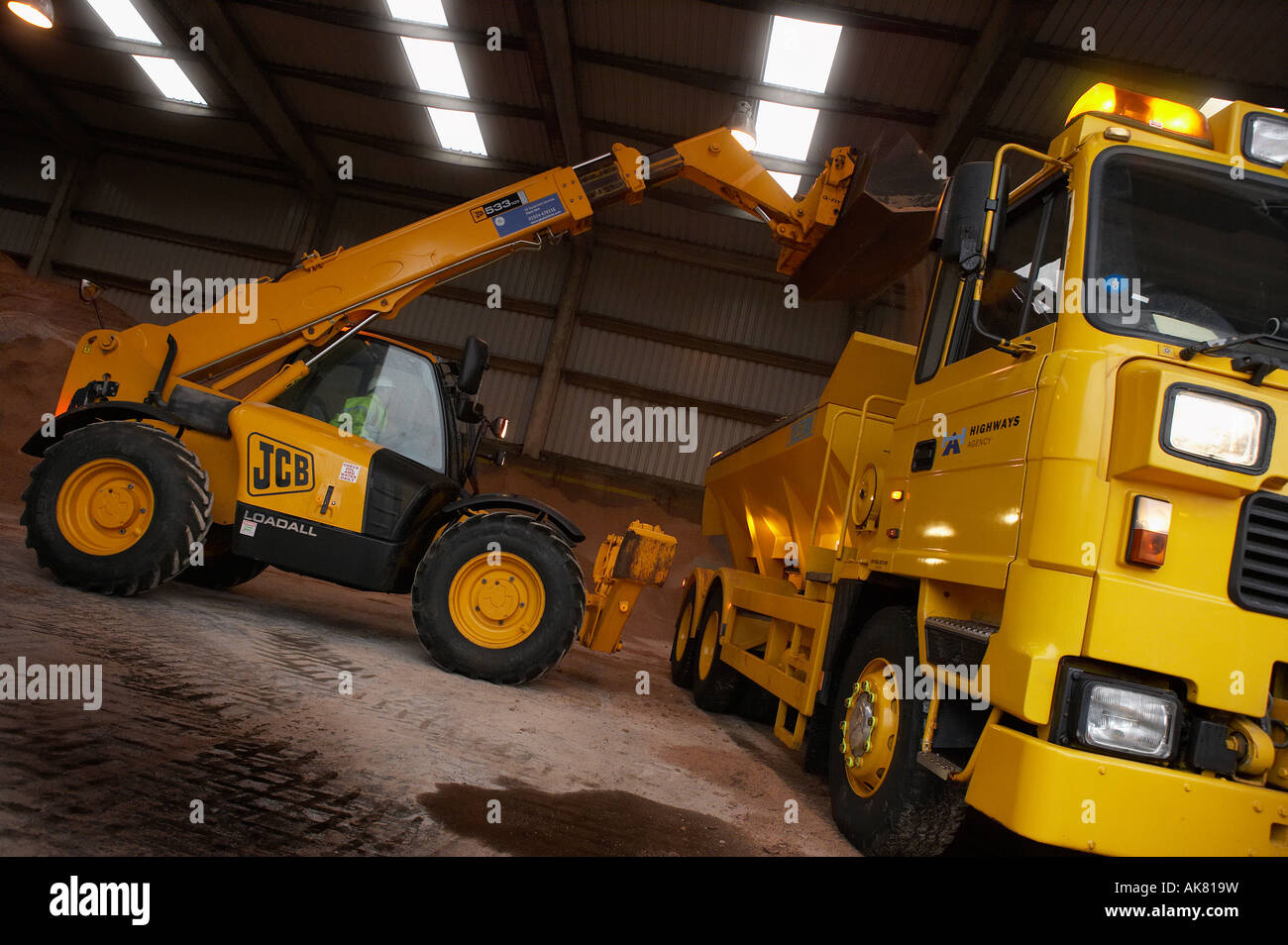 HIGHWAYS AGENCY GRITTING SNOW PLOUGH TRUCK LOADING WITH GRIT AND ROCK ...