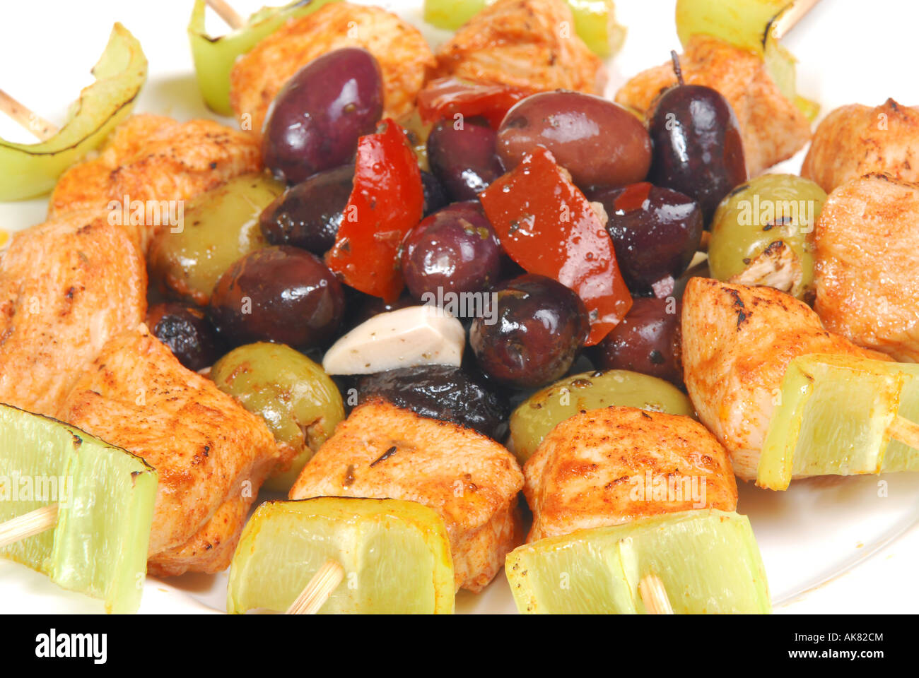 Spanish-style tapas of chicken, olive and pepper pinchitos, with ...