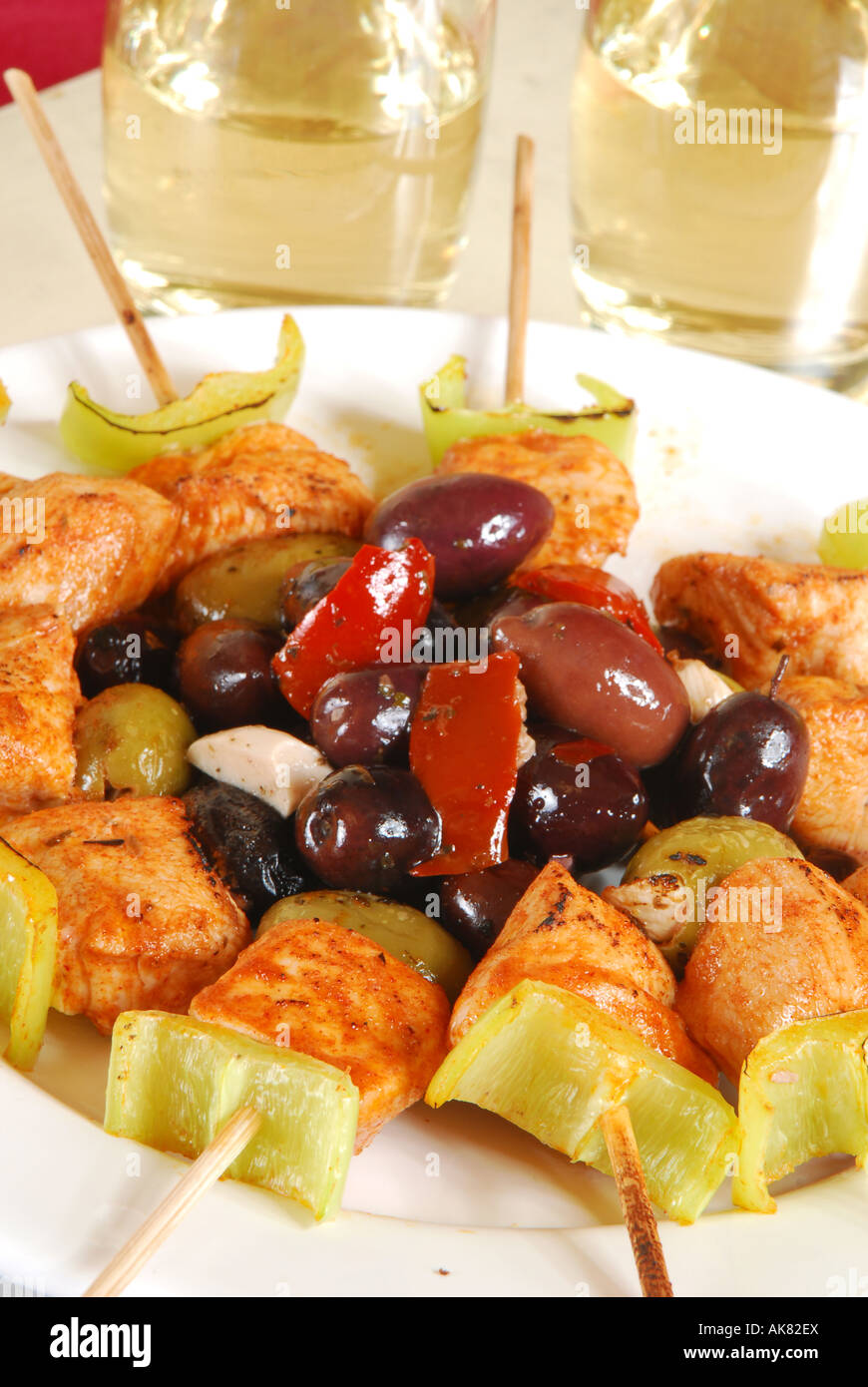 Spanish-style tapas of chicken, olive and pepper pinchitos, with ...