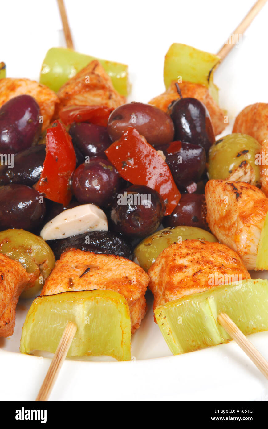 Spanish-style tapas of chicken, olive and pepper pinchitos, with ...
