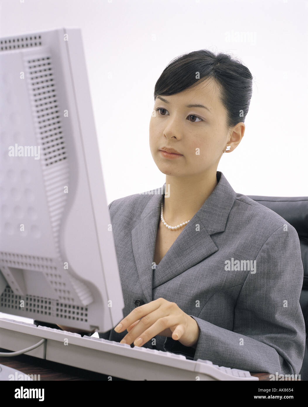 Businesswoman using computer Stock Photo - Alamy