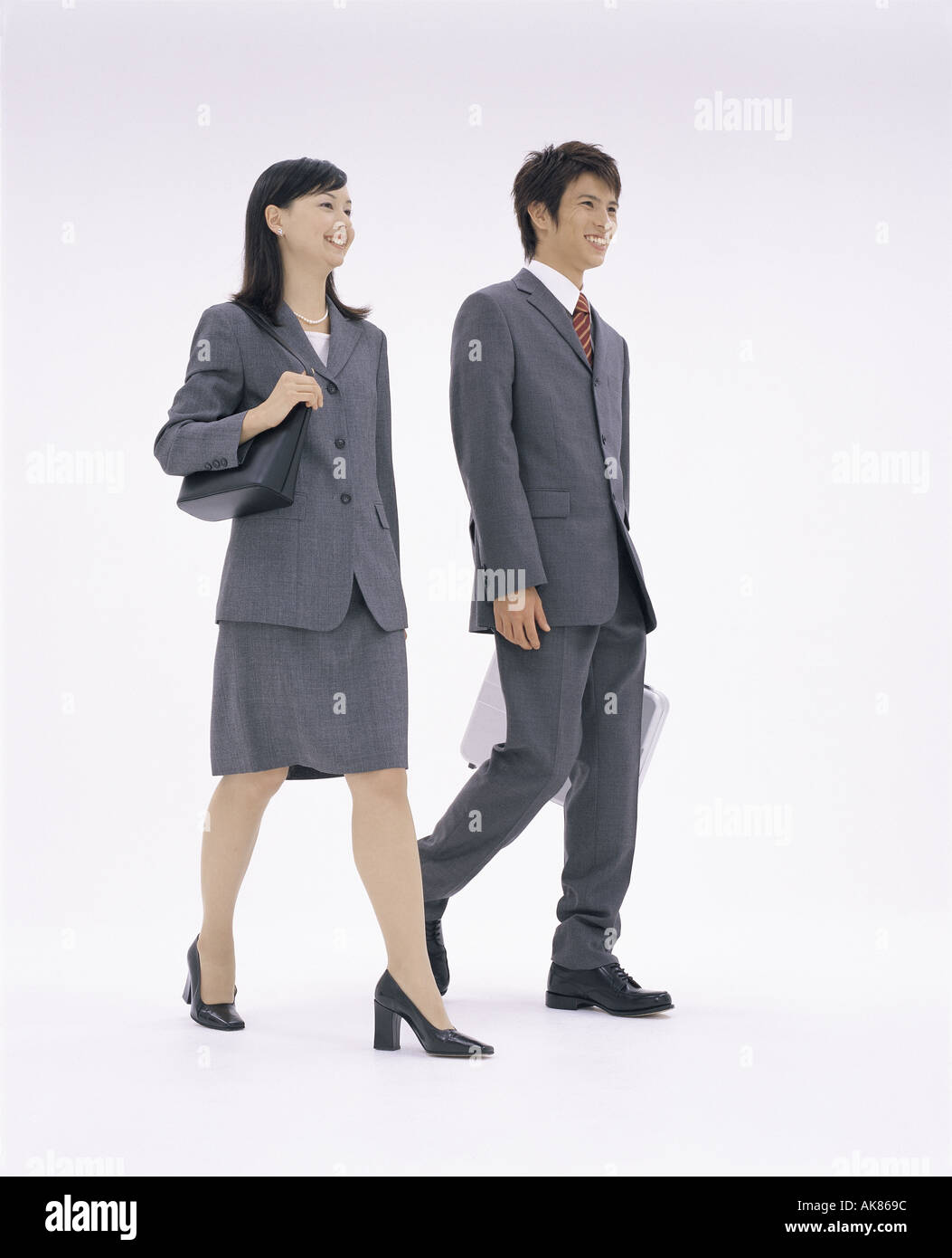 Business people walking Stock Photo - Alamy