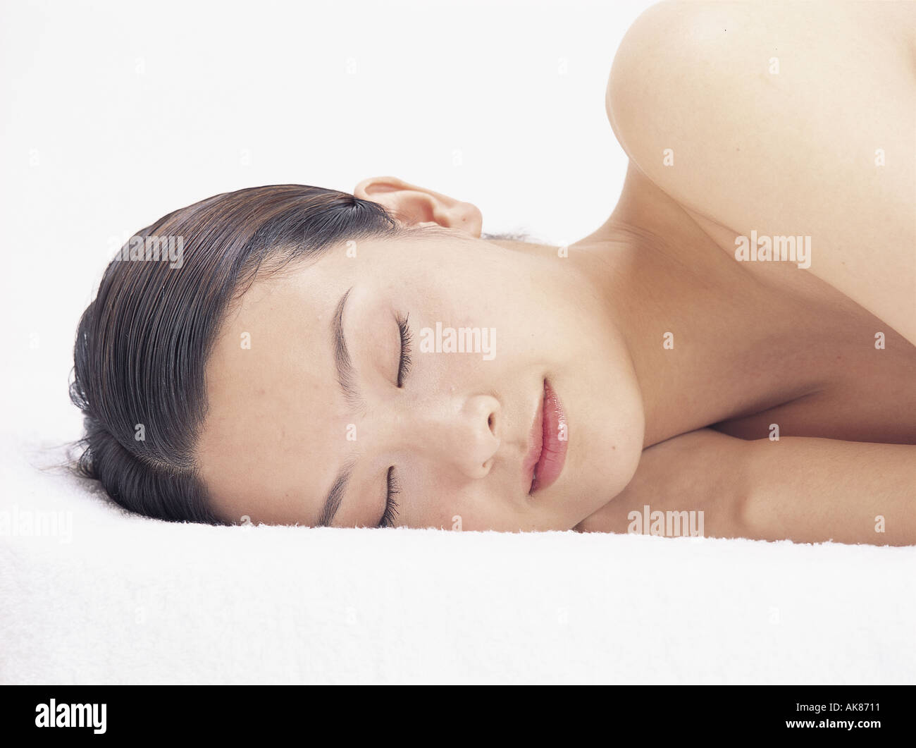 Woman laying down Stock Photo - Alamy