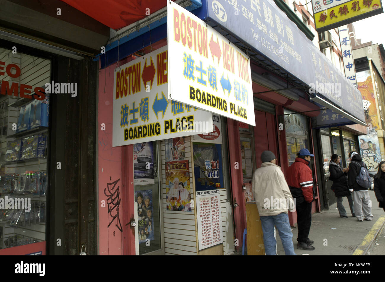 Colorful chinatown street people hanging signs Stock Photo - Alamy