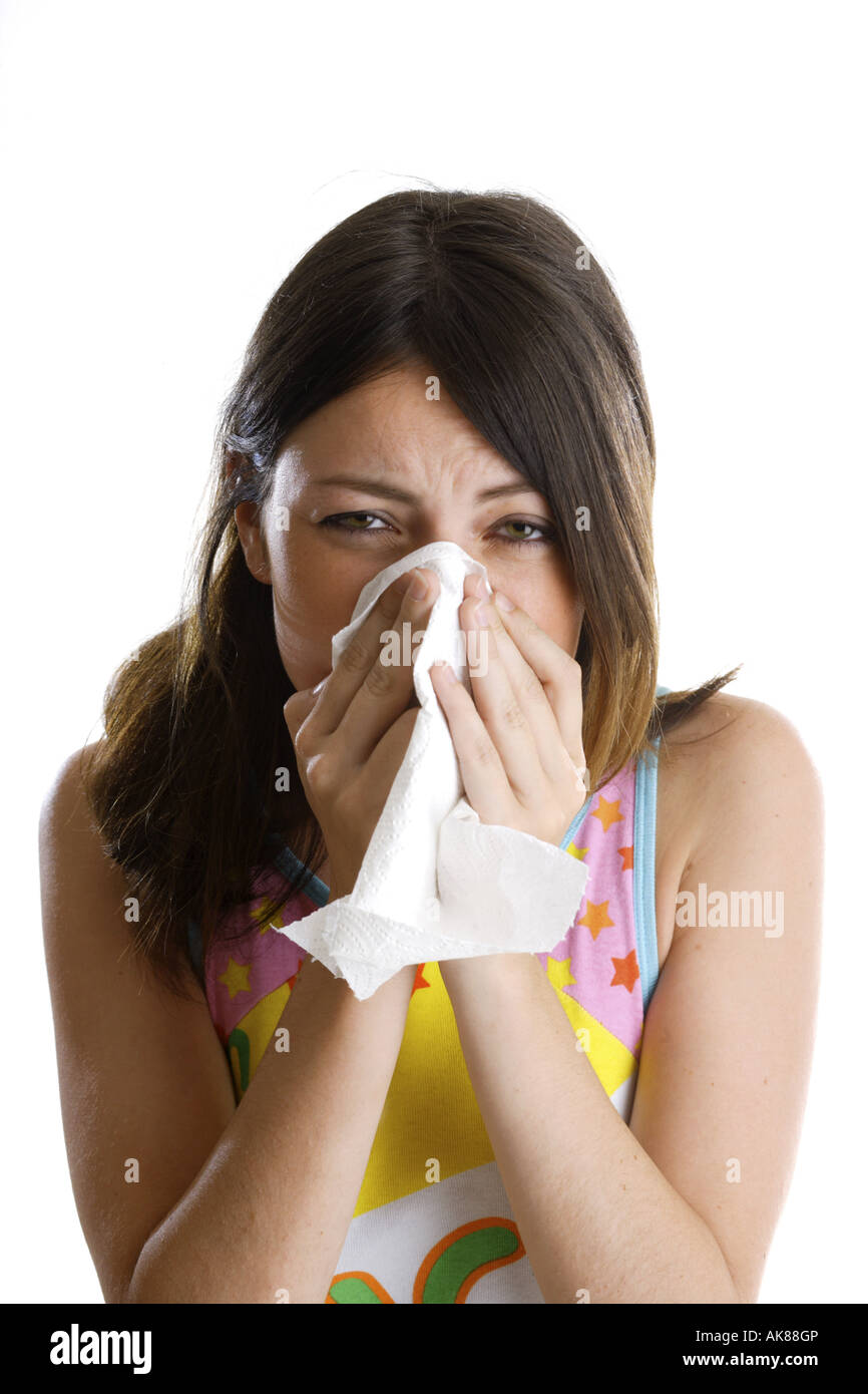 young woman cleaning her nose Stock Photo - Alamy