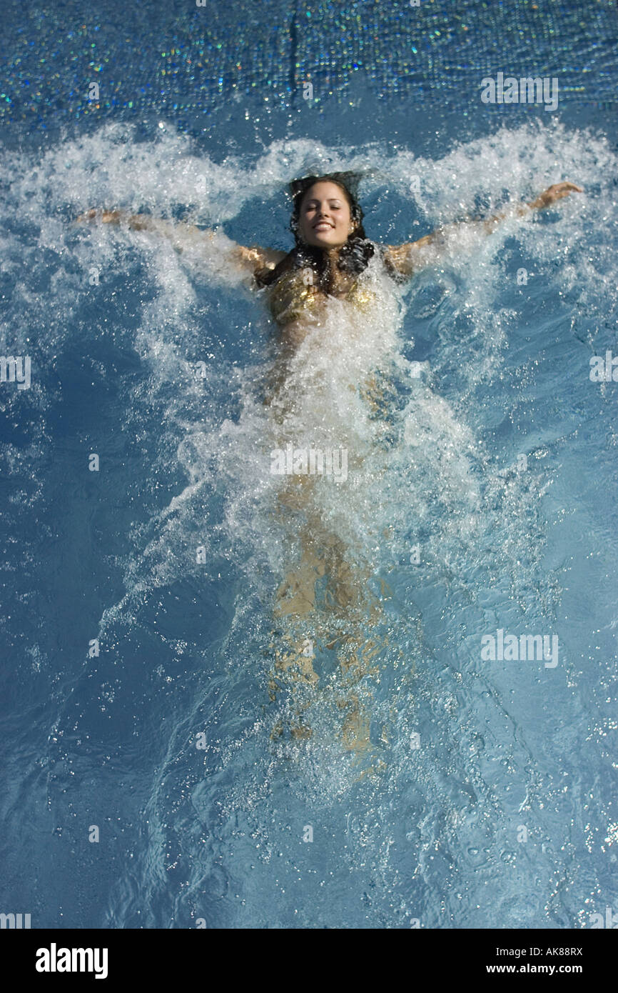 Young woman swimming backstroke hi-res stock photography and images - Alamy
