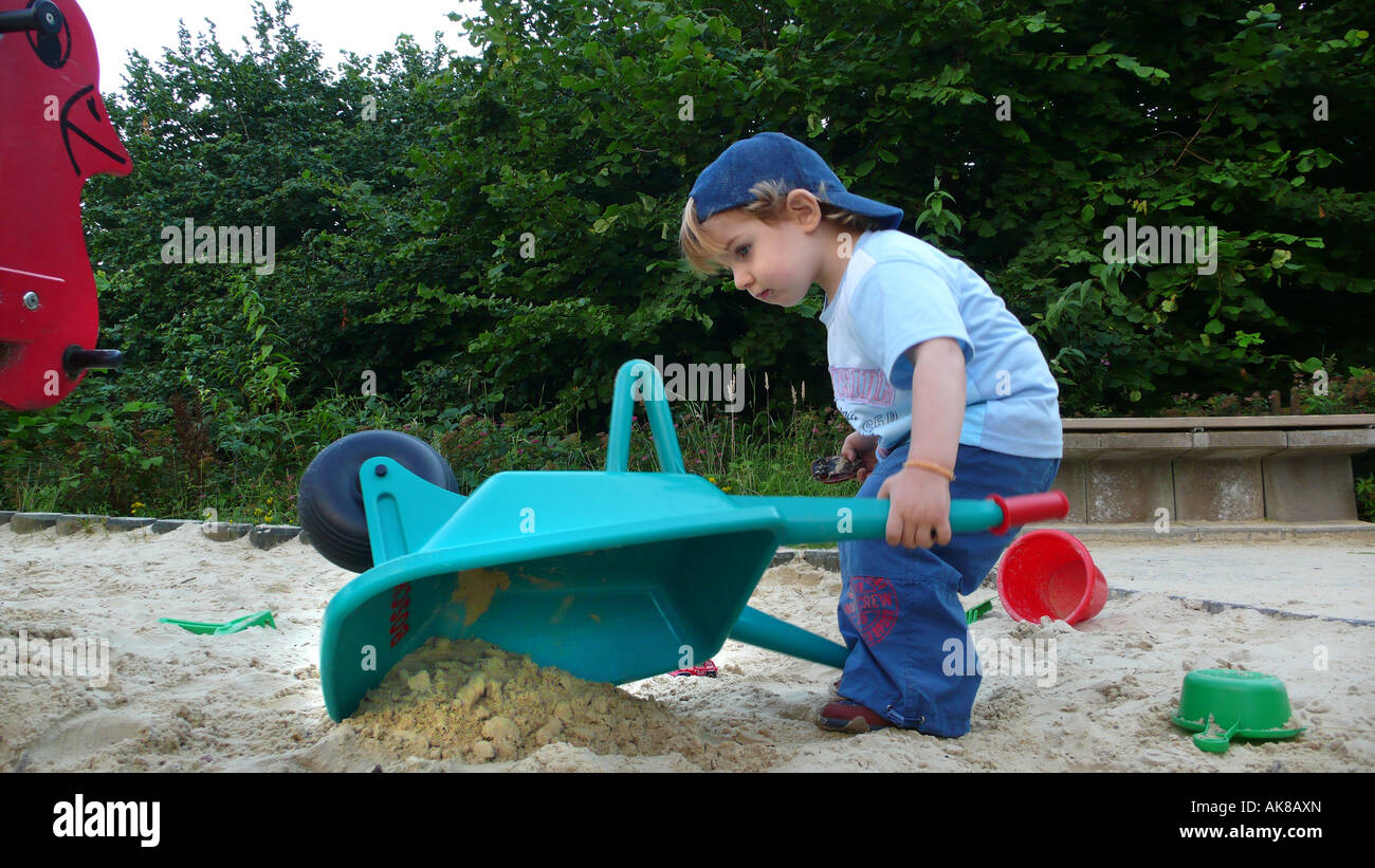 Little boys hand sand hi-res stock photography and images - Alamy