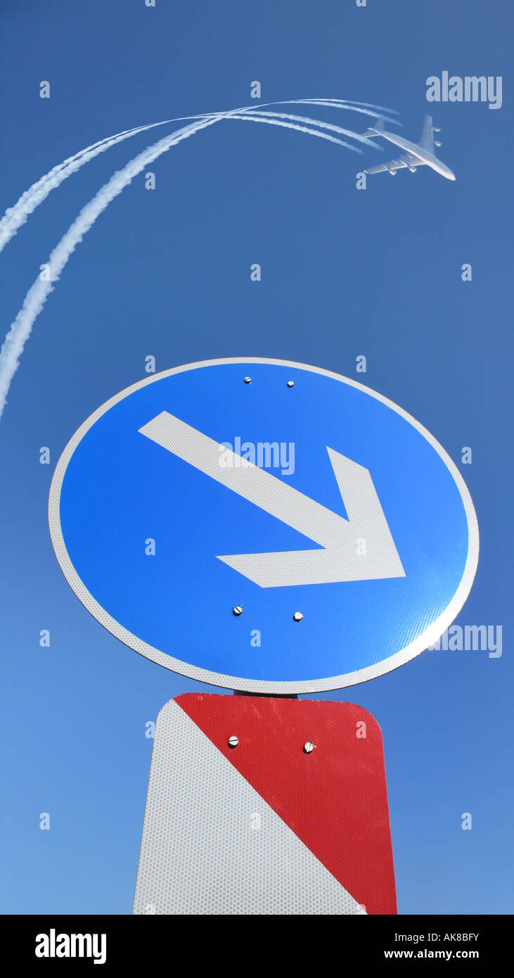 airplane obeying traffic sign, changing its direction Stock Photo - Alamy