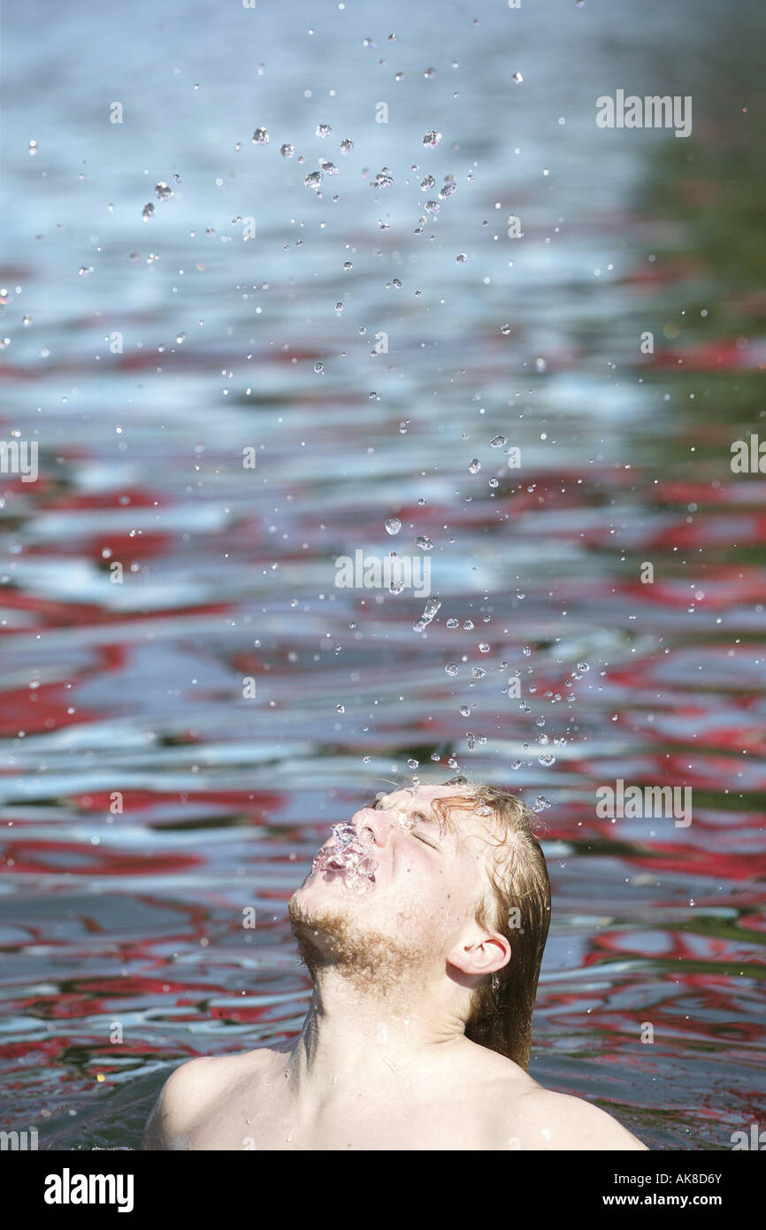 young man bathing Stock Photo - Alamy