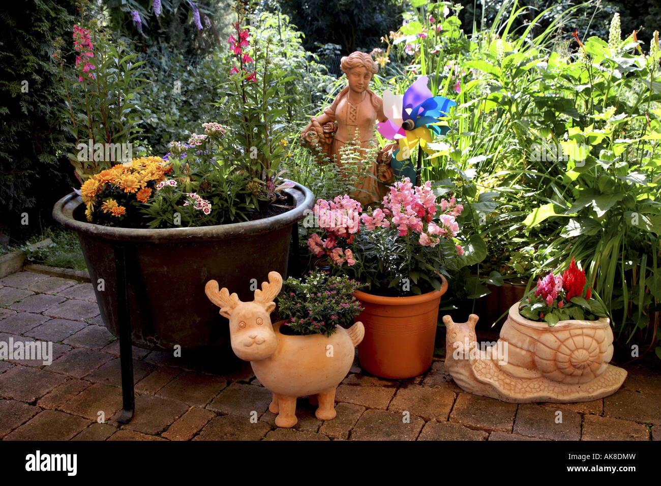 terrace with flowers and garden sculptures, Germany Stock Photo - Alamy