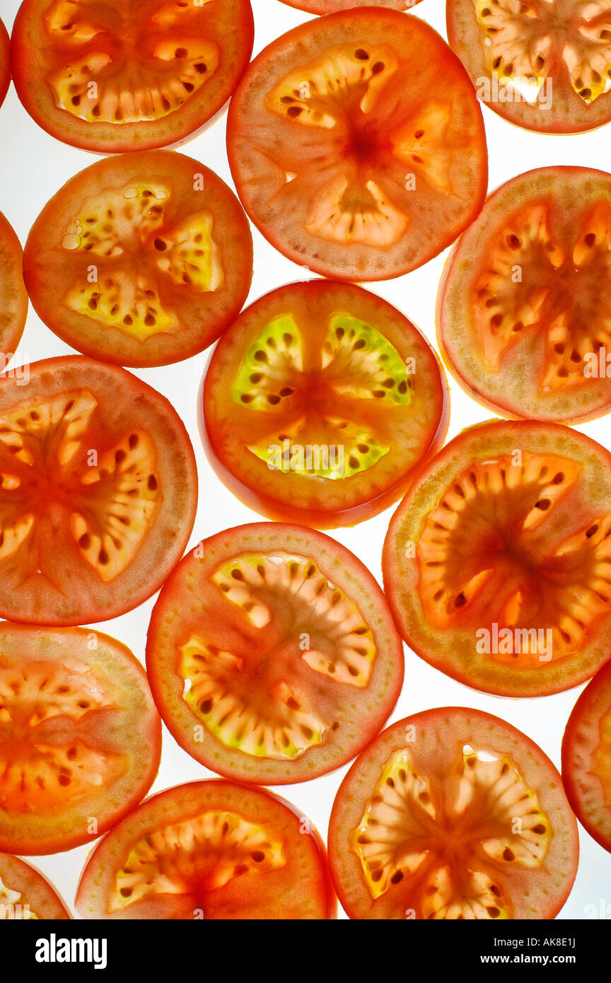 Sliced red tomatoes in Cut Out Stock Images & Pictures - Alamy