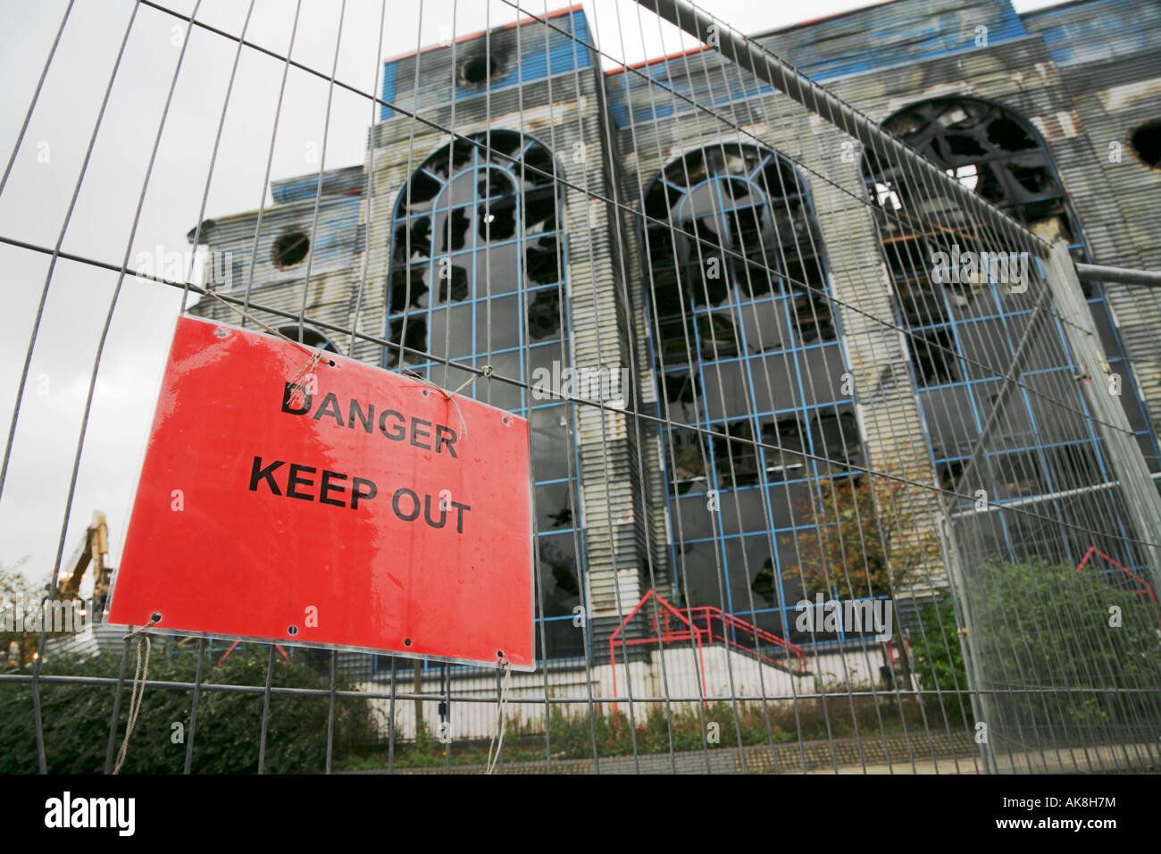 Danger Keep Out sign outside disused and burnt-out factory, Ladysmith ...