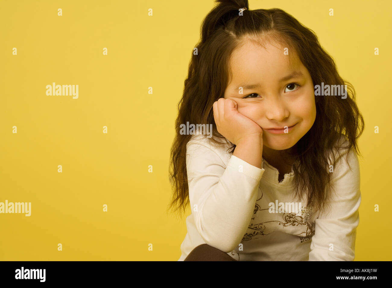 Portrait of little girl with a silly face Stock Photo - Alamy