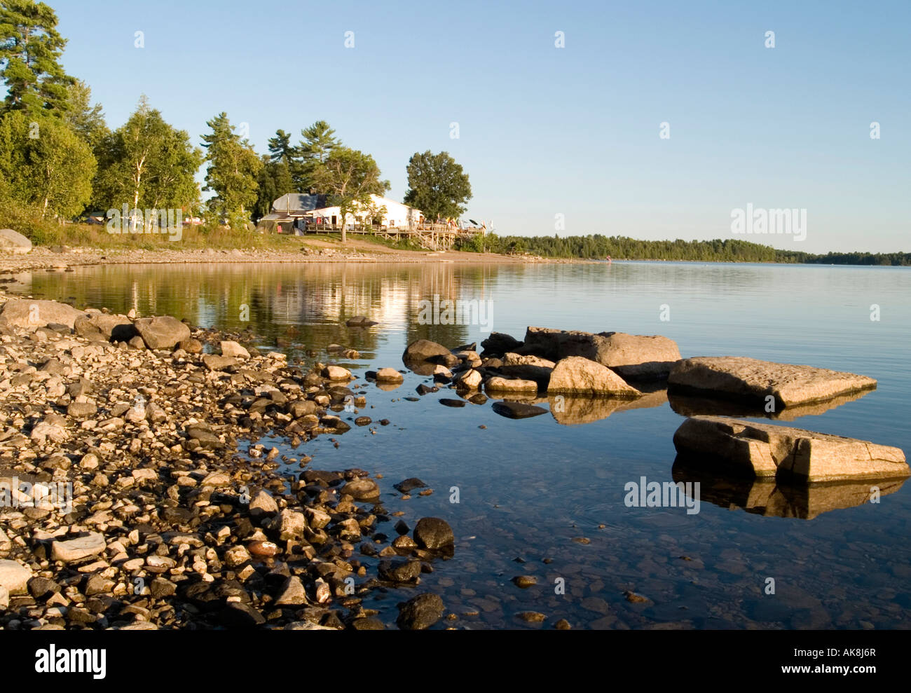 Rocks and stones in the water by the shore of the Upper Ottawa River ...