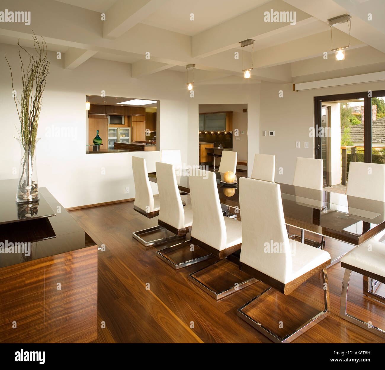 Modern White Dining Room with Hardwood Floors Stock Photo - Alamy