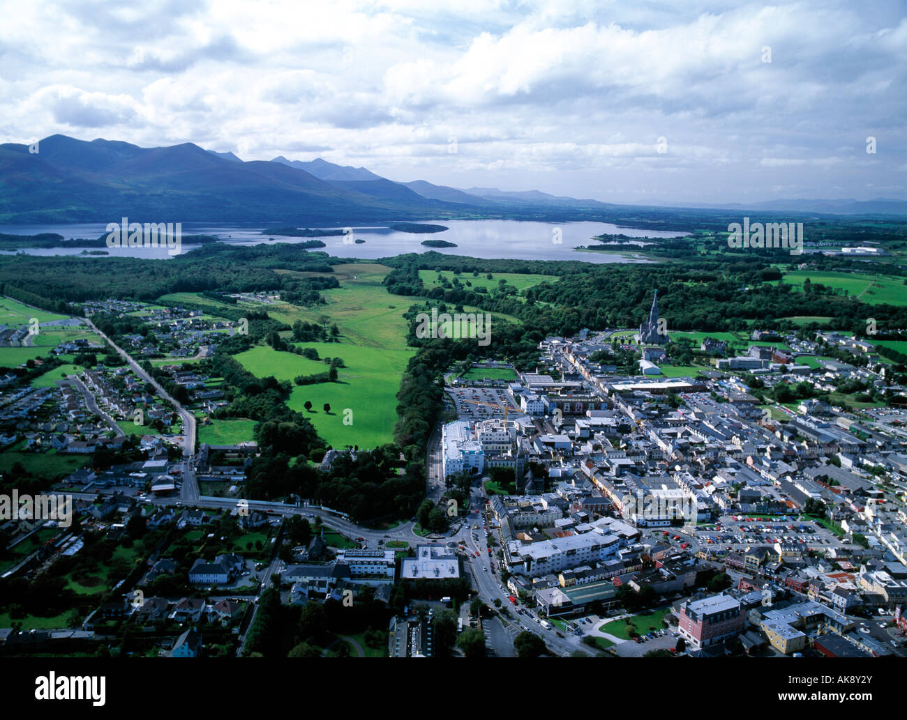 aerial image of an irish famous urban town surrounded by high mountains ...