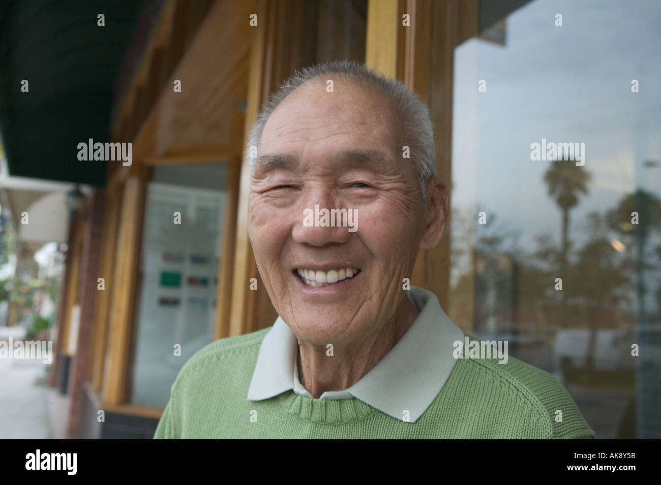 Smiling positive senior man hi-res stock photography and images - Alamy