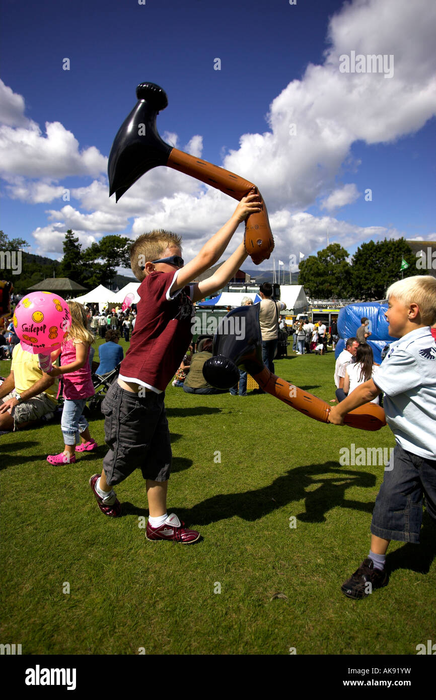 Funfair rides at the annual fair held on the Glebe - Bowness Bay on ...