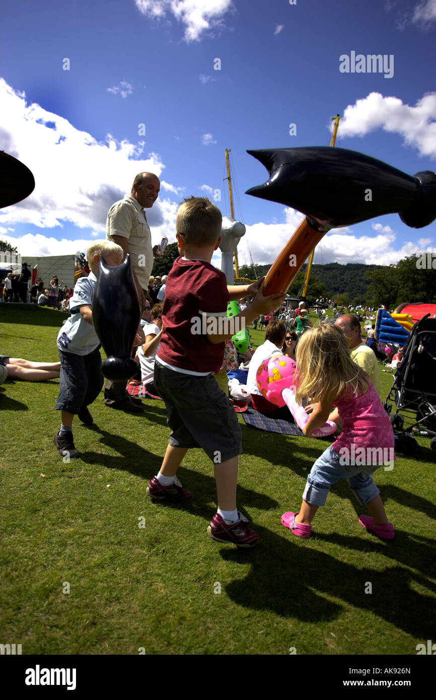 Funfair rides at the annual fair held on the Glebe - Bowness Bay on ...