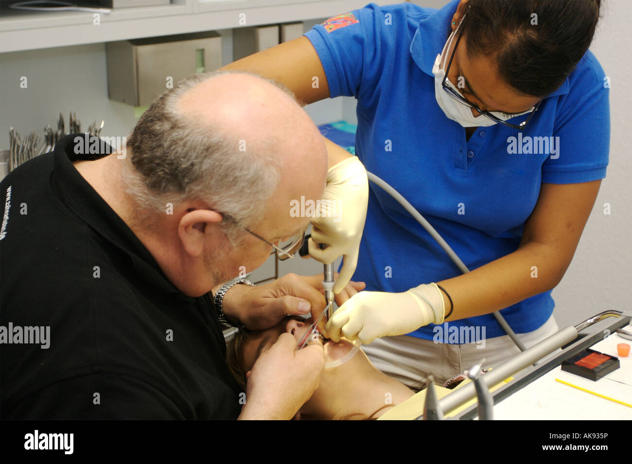 Orthodontist at work Stock Photo - Alamy