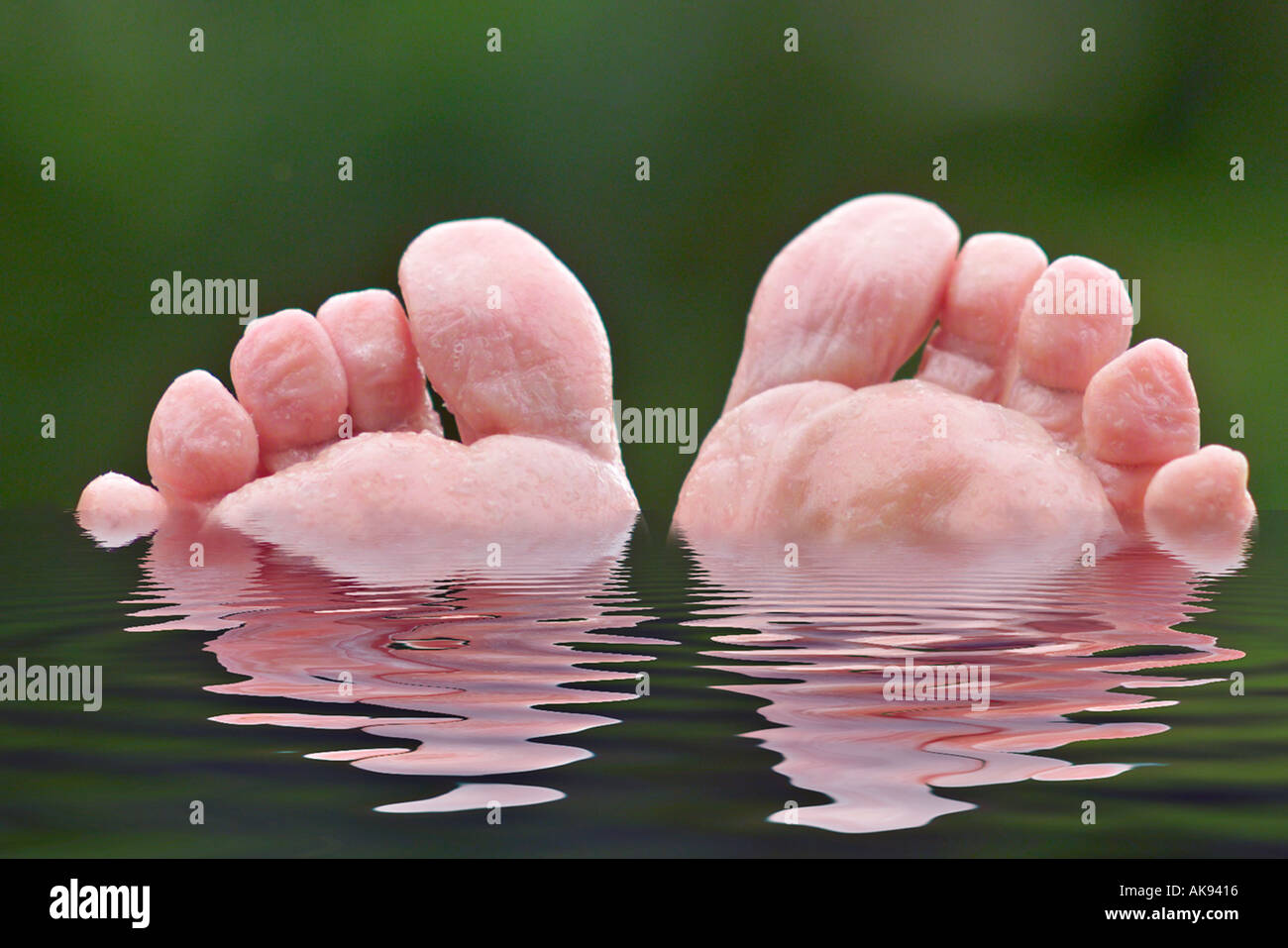 female human being toes floating in water Stock Photo - Alamy