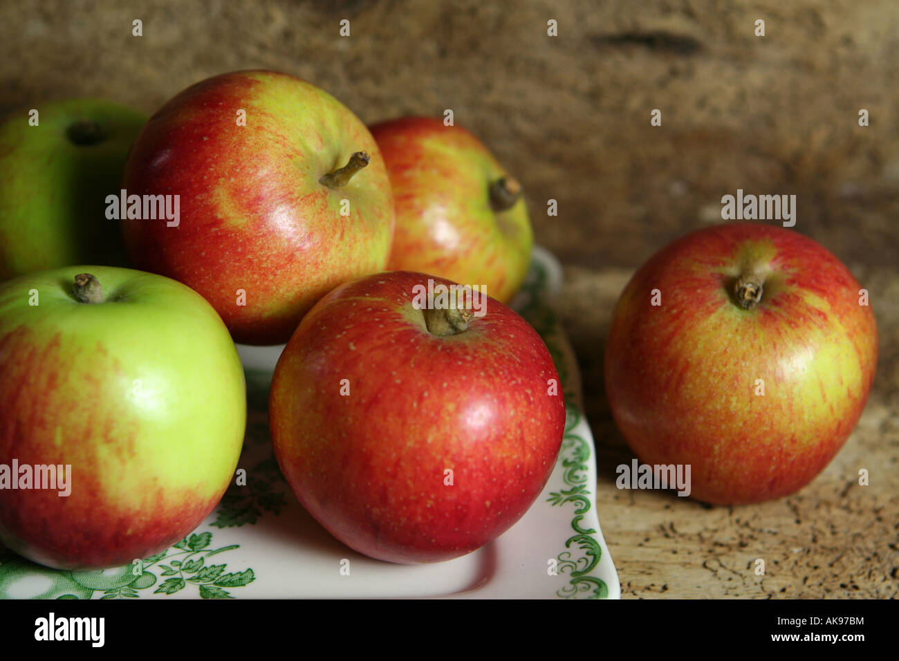 part of a plate of cox apples with one loose Stock Photo - Alamy