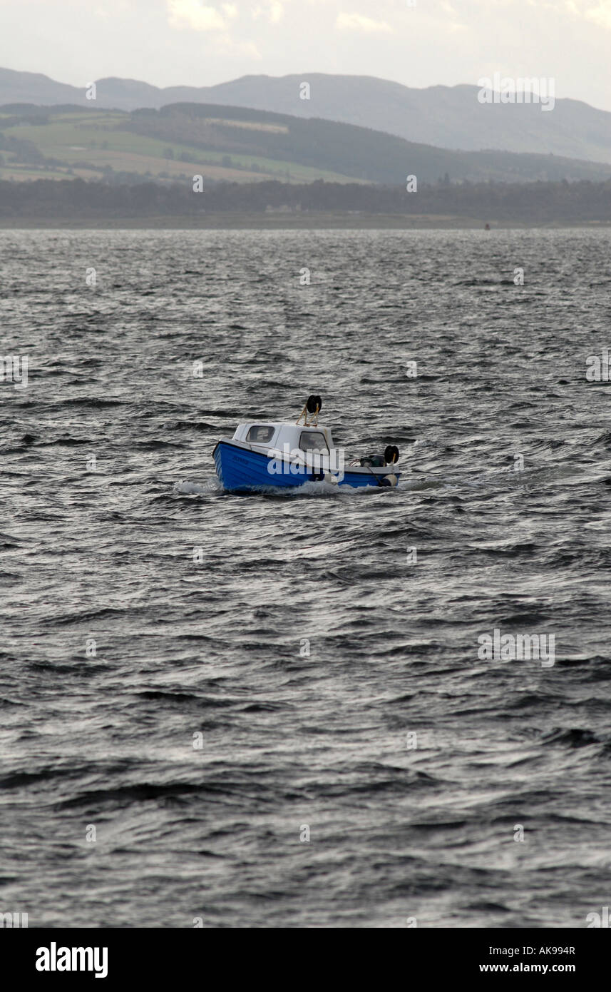 A SMALL BOAT IN SEAS OF THE MORAY FIRTH ,SCOTLAND.UK Stock Photo - Alamy