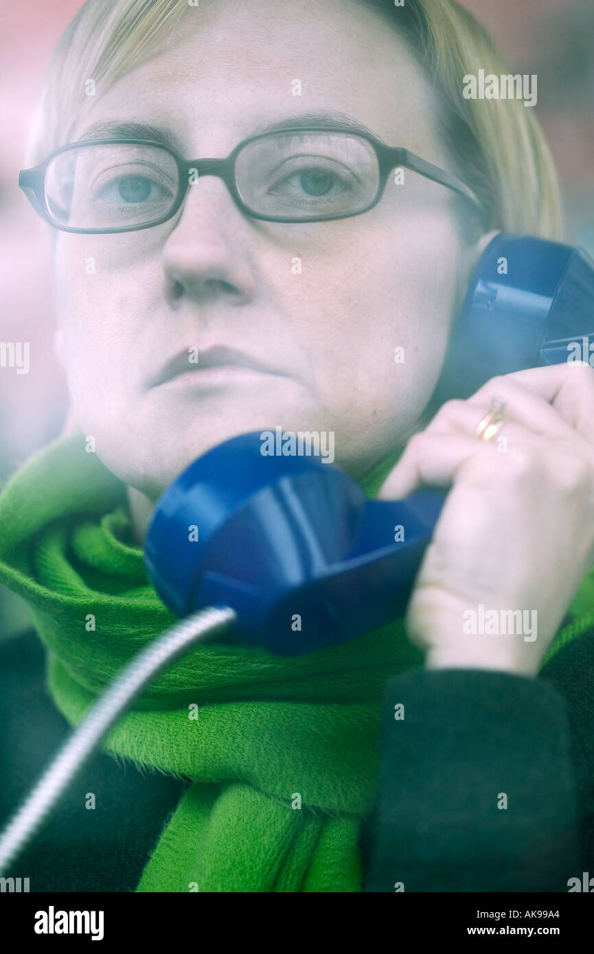 Woman in Phone Booth Paris France Stock Photo - Alamy