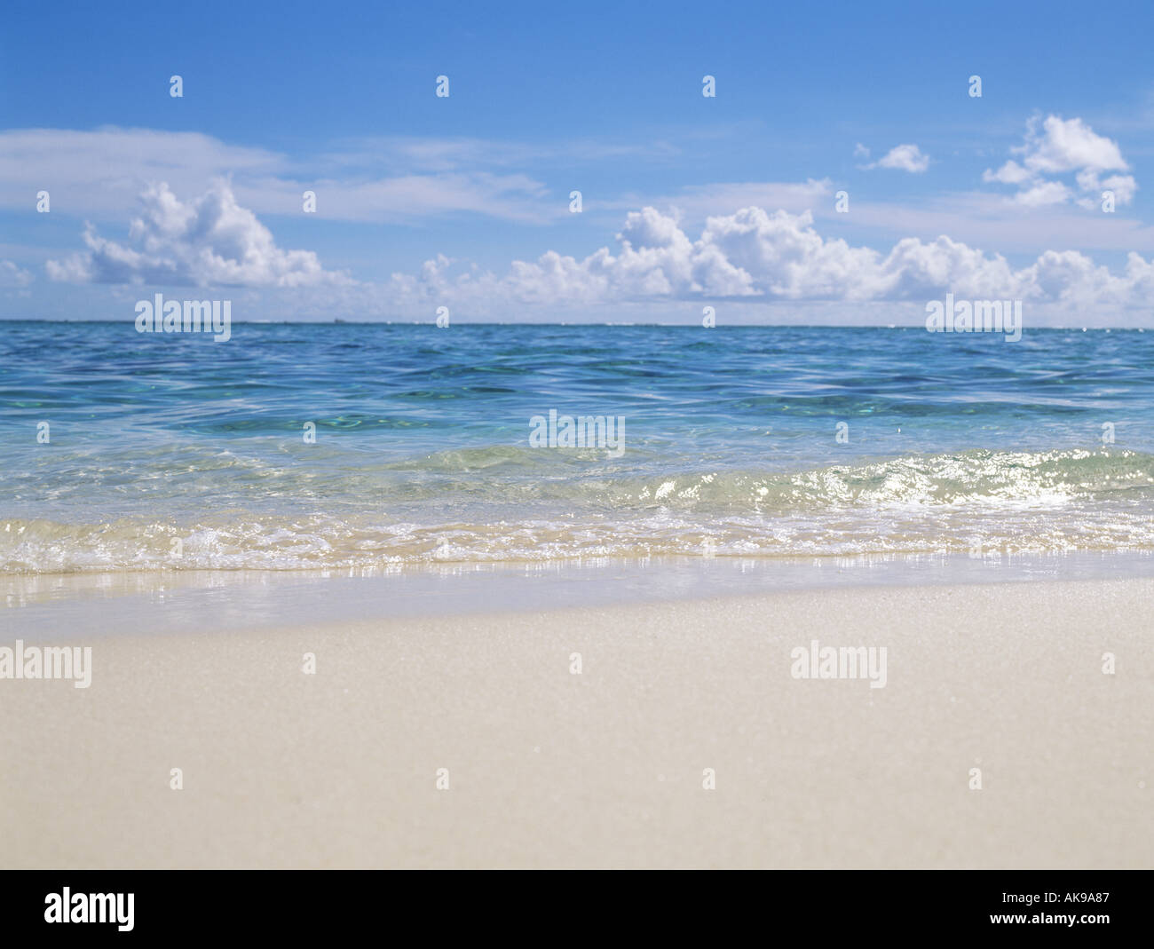 Beach Sea with cloud sand Stock Photo - Alamy