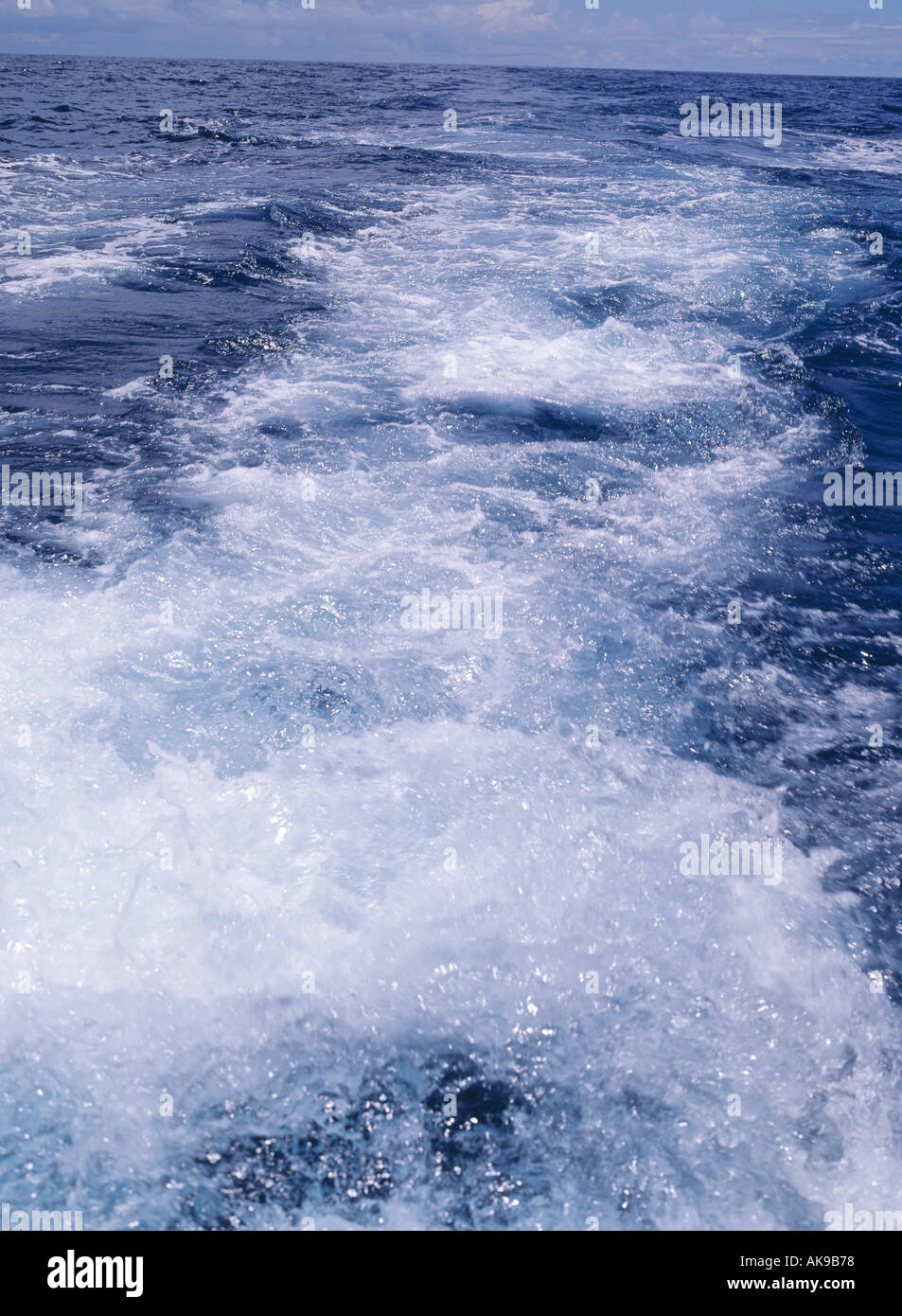 Wave by boat Stock Photo - Alamy