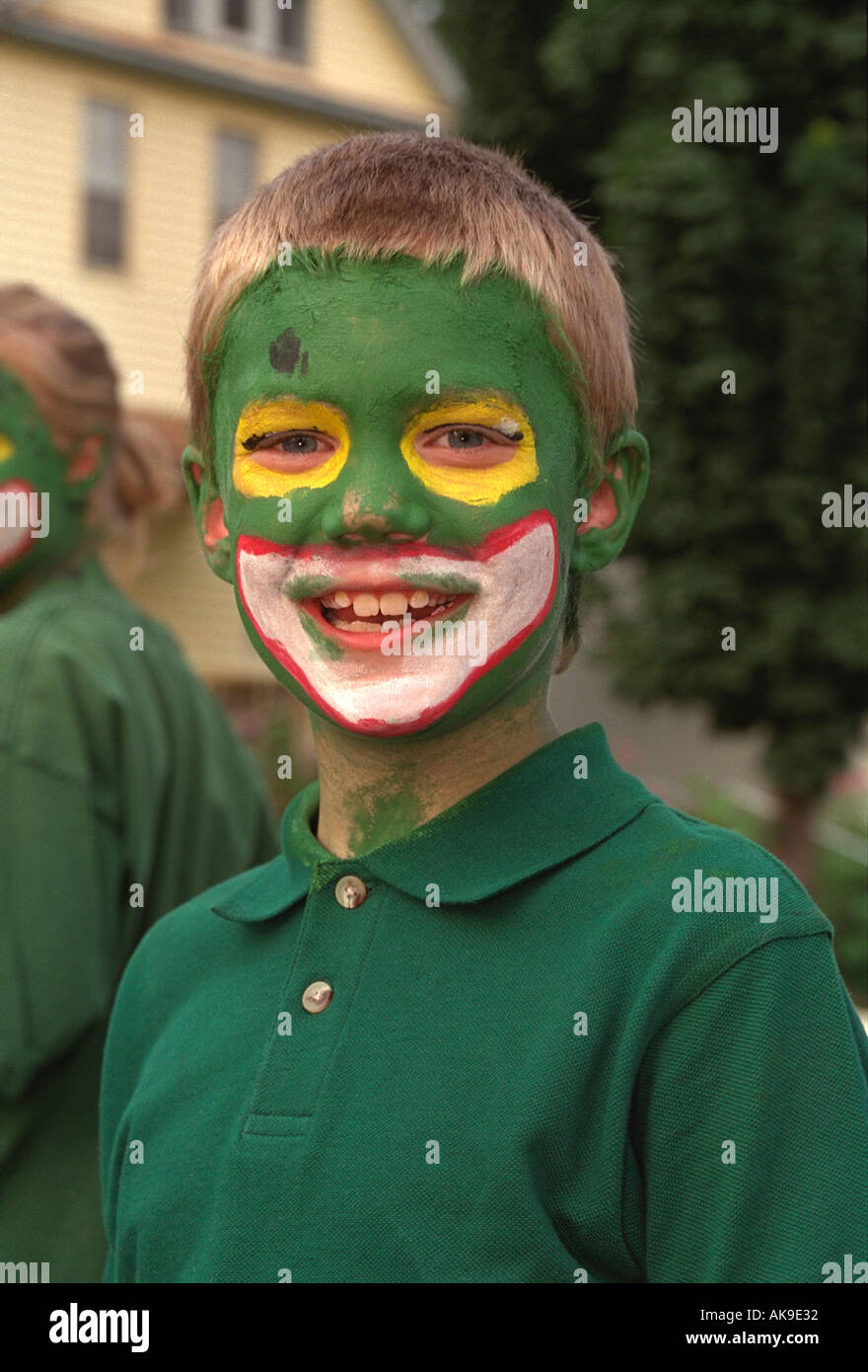 Frog boy age 11 participating in the Frogtown Parade and Festival. St ...