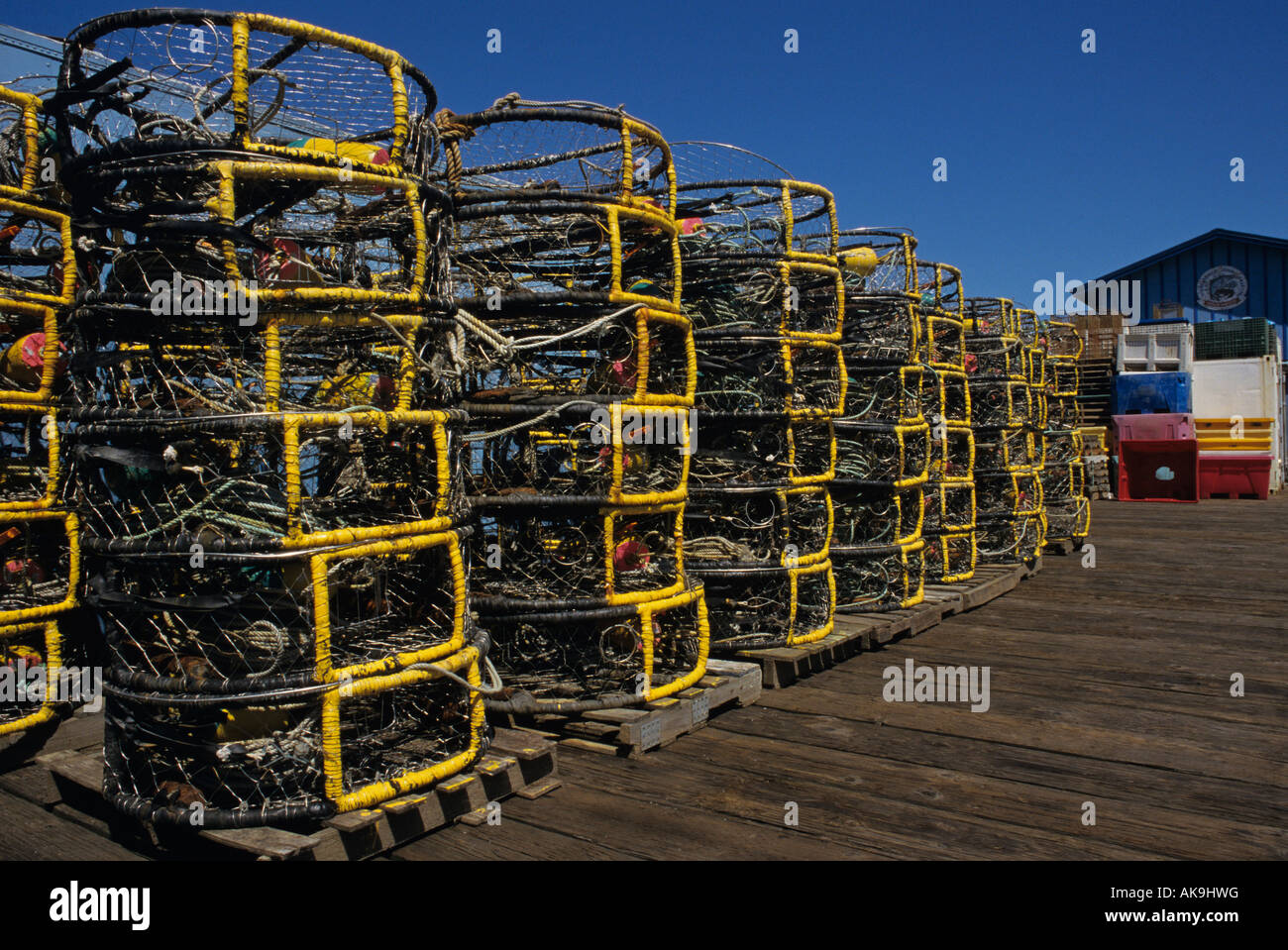 Crab pods stacked along fishing dock along the Siuslaw river Pacific ...