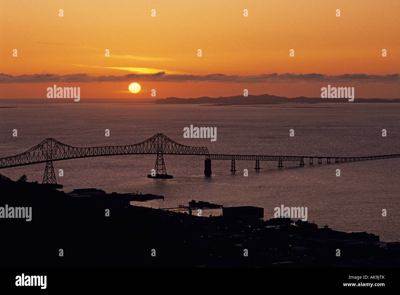 Sunset mouth of the Columbia River Astoria Megler bridge silhouetted ...